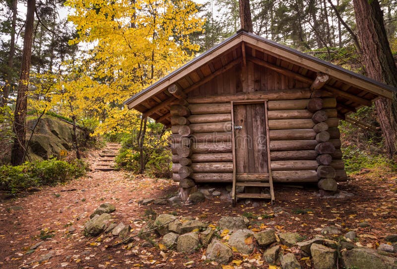 Log Cabin in a Forest in the Fall. Stock Photo - Image of exterior ...