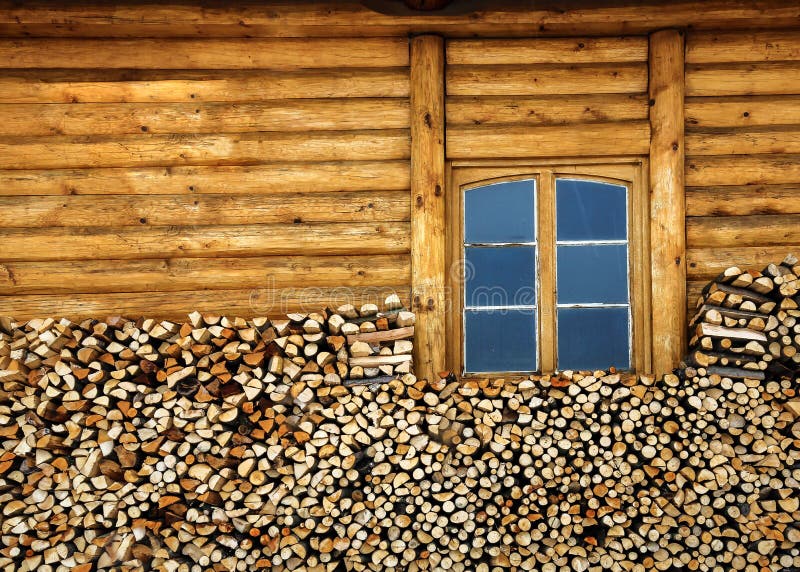 Log stack in front a barn stock image. Image of wooden - 238280405