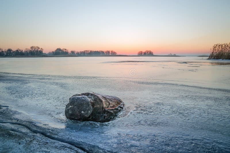 The Log is in the Frozen Lake, Ice, Winter Landscape Stock Image ...