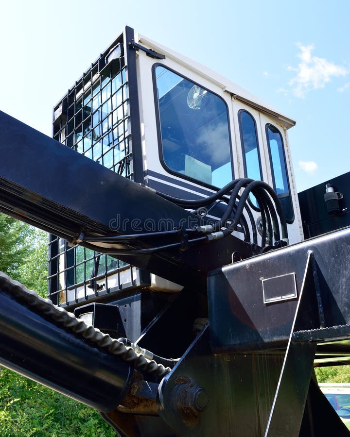 Log Loader Cab on Timber Harvest Site Stock Image - Image of slasher ...