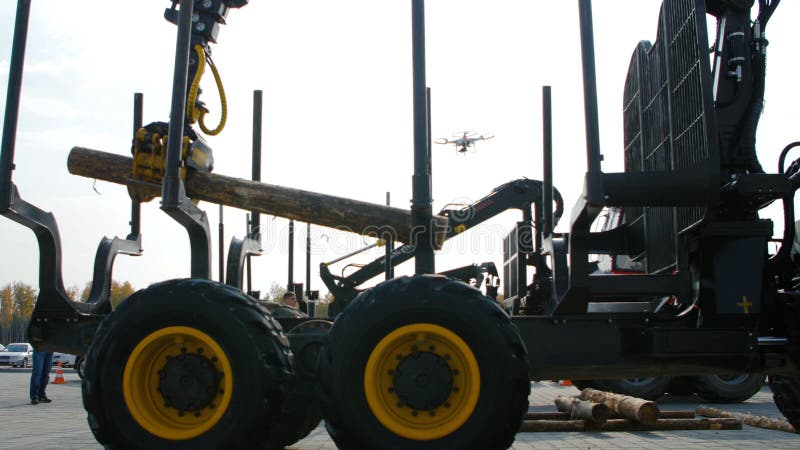 Log Loader or Forestry Machine Moves Fresh Cut Logs for Loading Stock ...