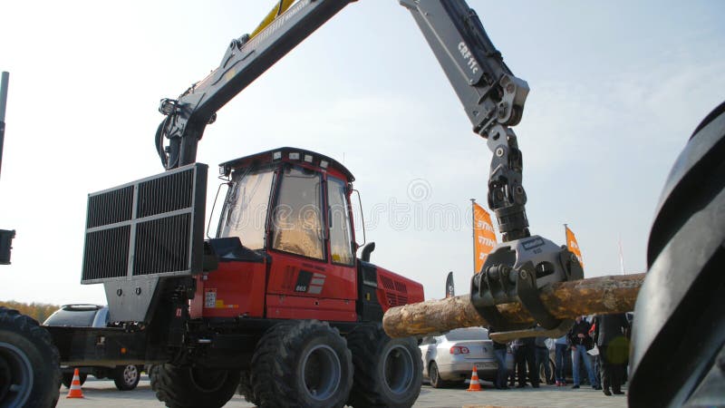 Log Loader or Forestry Machine Moves Fresh Cut Logs for Loading ...