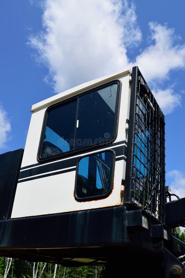 Log Loader and Slasher Cab with Blue Sky Stock Photo - Image of timber ...