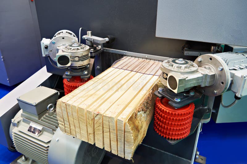 Log sawing machine stock image. Image of spruce, process - 210103313