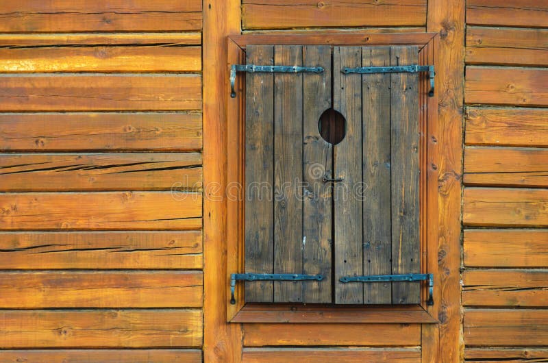 Log Wall with Closed Wooden Window Shutters Stock Image - Image of ...
