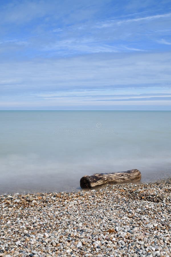 Log on the beach stock image. Image of color, simplicity - 115180621