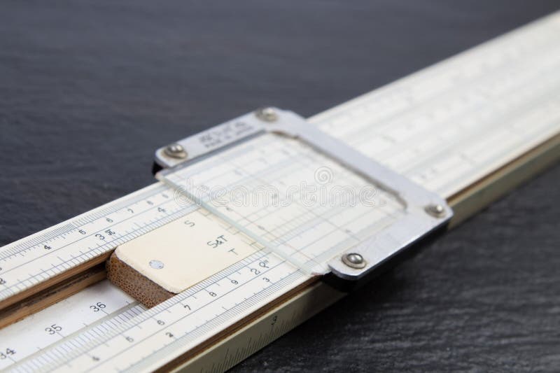 Logarithmic Ruler on Black Background. Stationery for Engineers and ...