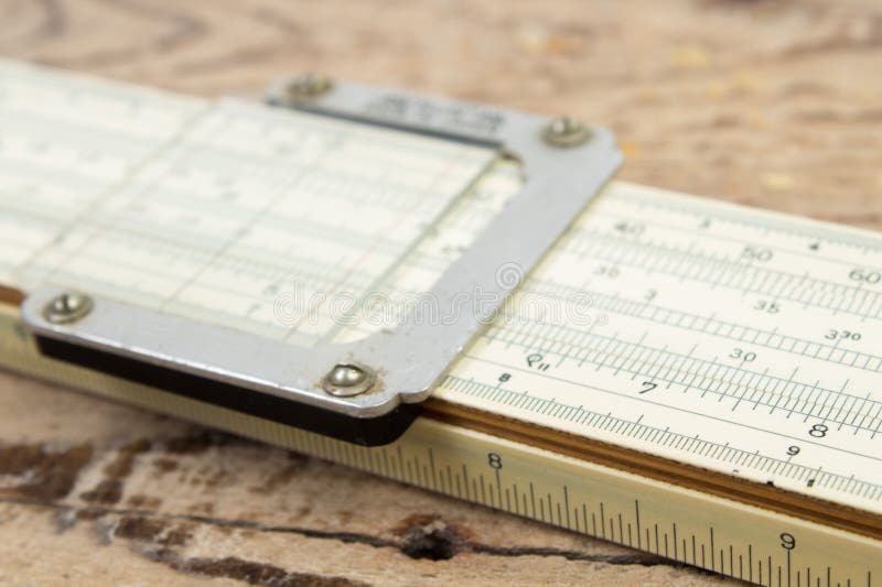 Logarithmic Ruler, Pencil on a Wooden Table. Stationery for Engineers ...