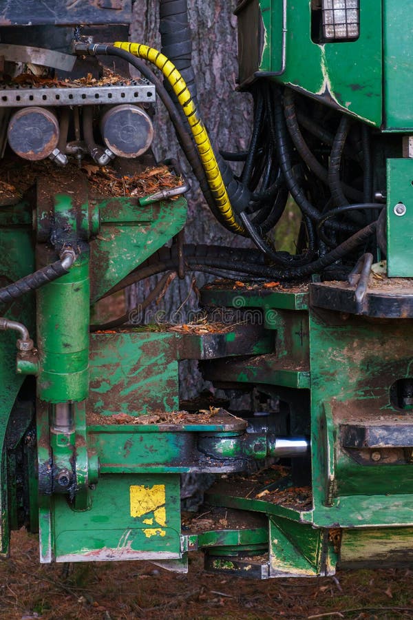 Loading Logs on a Truck Trailer Using a Tractor Loader with a Grab ...