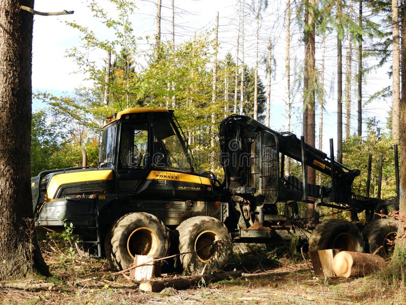 Logging Machinery in the Field for Harvesting Trees Stock Photo - Image ...