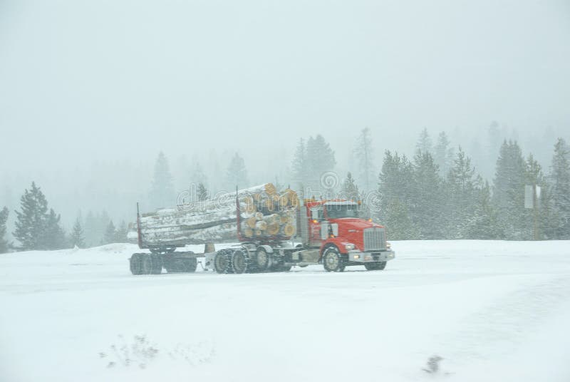 Logging truck on icy road stock photo. Image of freeway - 44615720