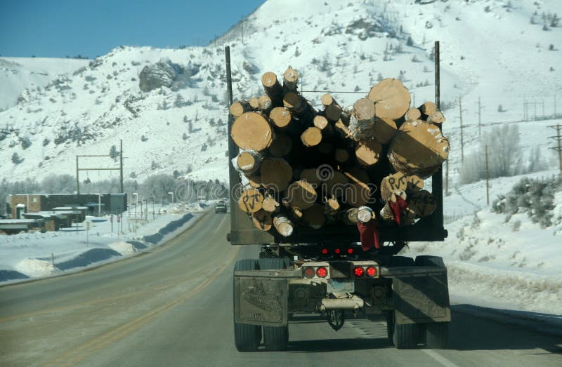 Logging Truck on Snowy Roads Stock Photo - Image of road, logging: 10721374