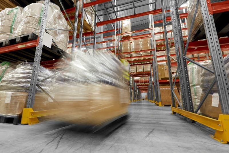 Worker Carrying Loader with Goods at Warehouse Stock Image - Image of ...