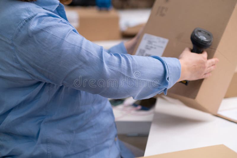 Logistic Shipping Online Orders Concept. Close Up Scanning Barcode on ...