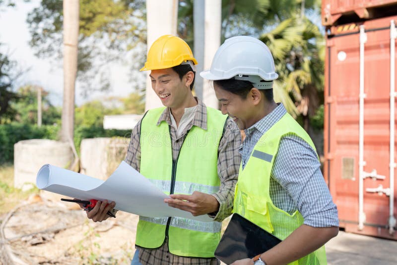 Logistics Engineer Collaboration on Project Plans Construction Site ...