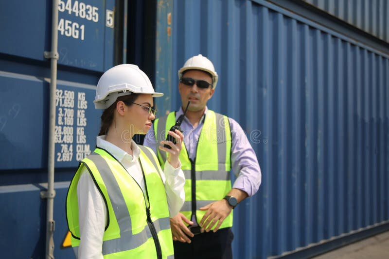 Logistics Engineer Control at the Port, Loading Containers for Trucks ...