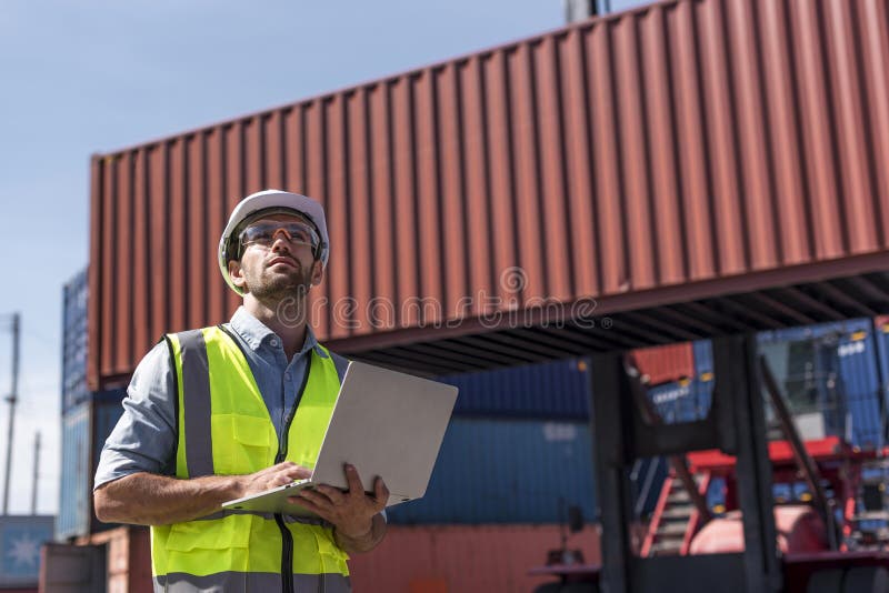 Logistics Engineer Control at the Port, Loading Containers for Trucks ...