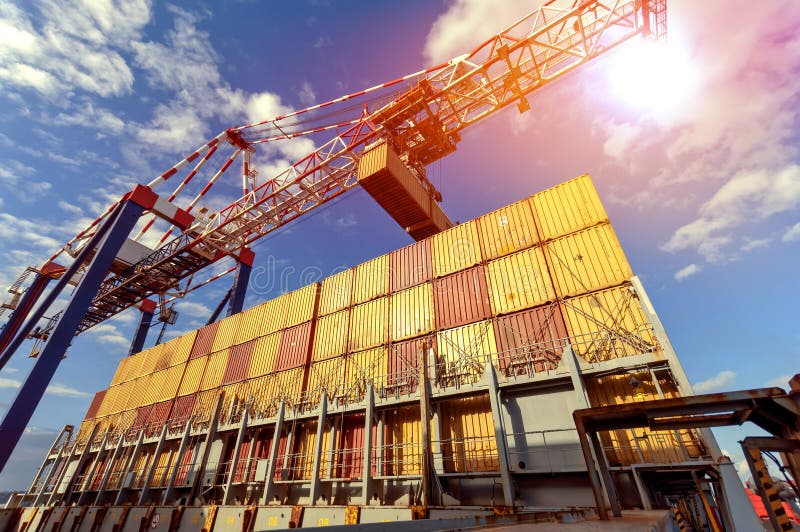 Container Cargo Freight Ship with Working Crane Bridge during Po Stock ...