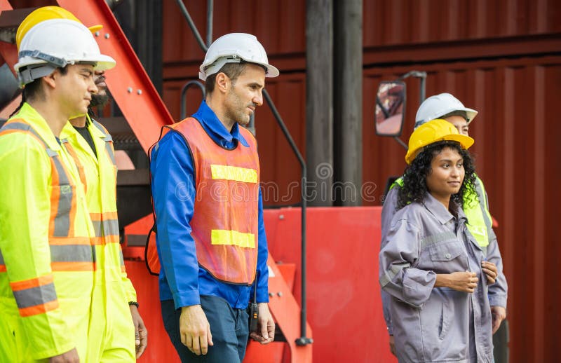 Logistics Manager and Engineers Foreman Workers Team at Shipping ...
