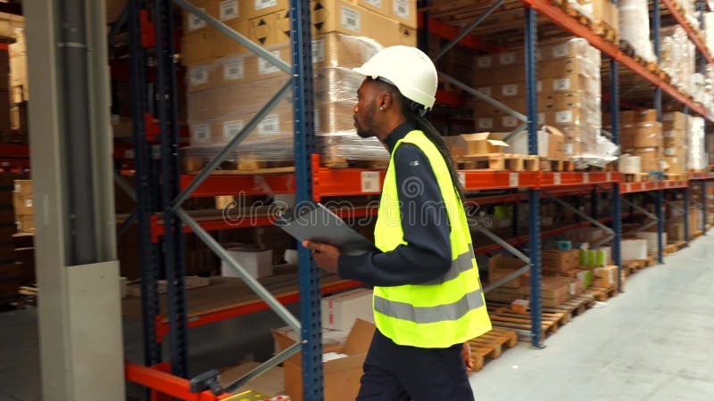 Logistics Operator Walking through Warehouse Stock Footage - Video of ...