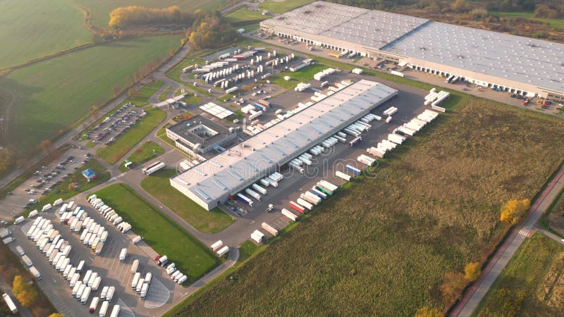 Logistics Park with a Warehouse and Loading Hub. Semi-trucks with Cargo ...