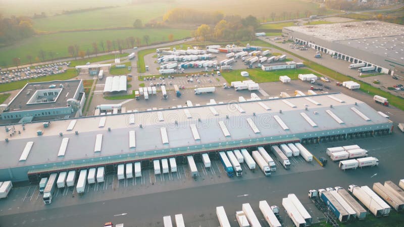 Logistics Park with a Warehouse and Loading Hub. Semi-trucks with Cargo ...