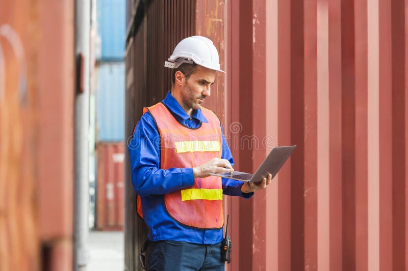 Logistics Professional Inspecting Containers, Engineer Man with Laptop ...