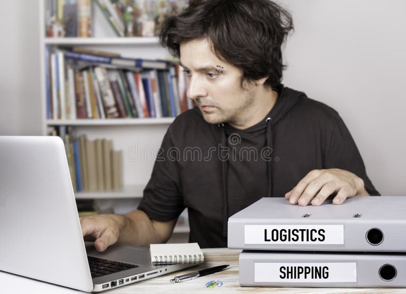 Logistics and Shipping - Two Folders on Office Desk. Man Workin Stock ...