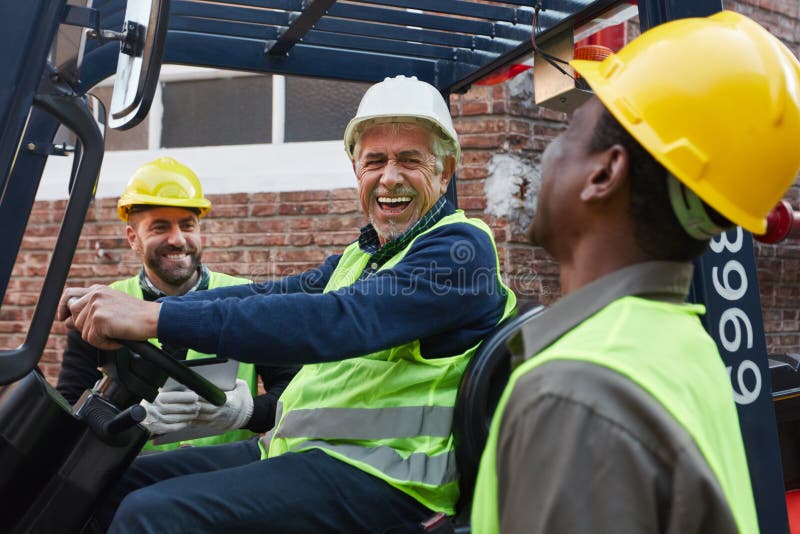 Logistics Team Has Fun Loading Stock Photo - Image of forklift ...