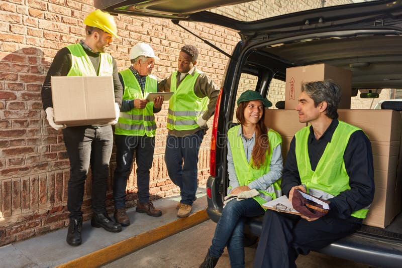 Logistics Team in Front of a Factory is Having Fun Stock Photo - Image ...