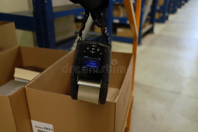 Logistics Warehouse - Scanner for Picking Products in the Warehouse ...