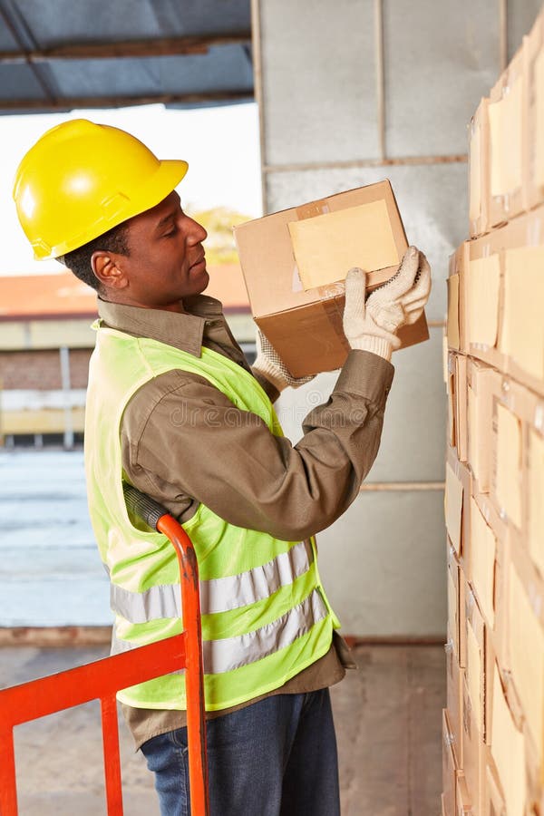 Logistics Worker is Preparing a Package Stock Image - Image of inside ...