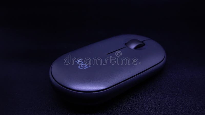 A Logitech Mouse with a Shot on a Black Background. Editorial Stock ...