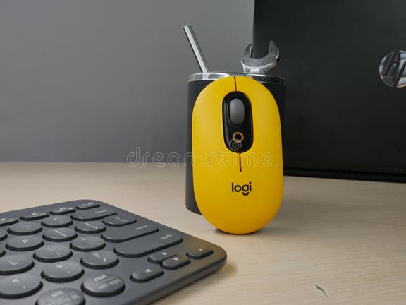 Logitech Pop Yellow mouse editorial stock image. Image of lighting ...