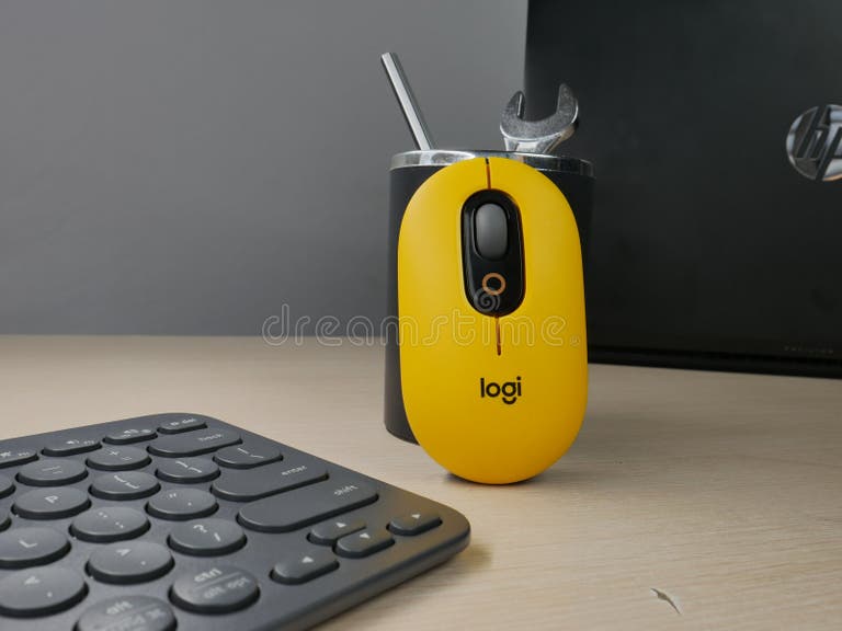 Logitech Pop Yellow mouse editorial stock image. Image of lighting ...