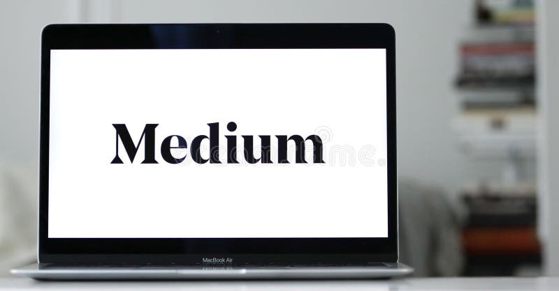 Logo Design of Medium on a Laptop Screen in Blurred Background ...