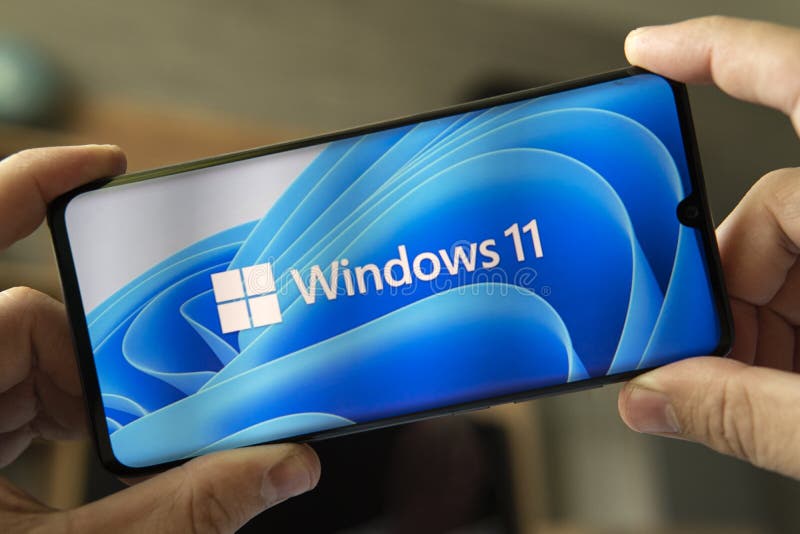 The Logo of the New Windows 11 Operating System on the Smartphone ...