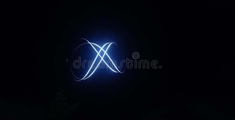 A Logo Written by Using Blue Colour Light in Night Light Painting Stock ...