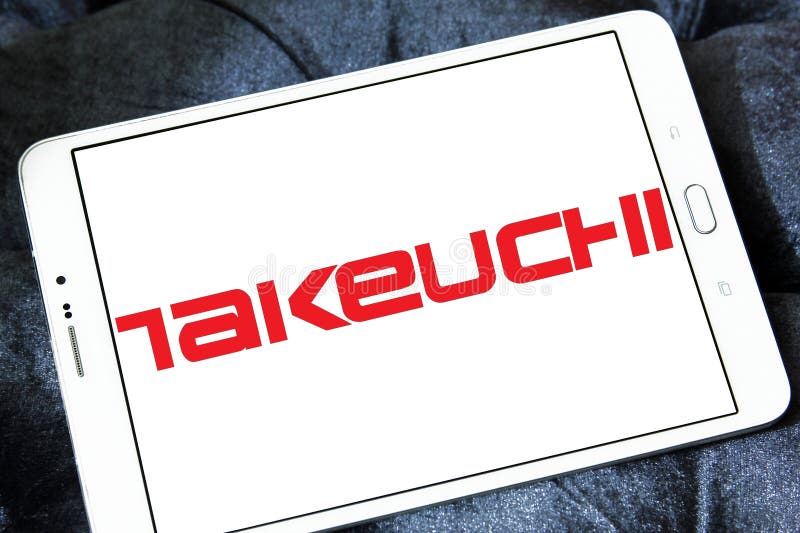 Logotipo Da Empresa De Takeuchi Manufacturing Imagem de Stock Editorial ...