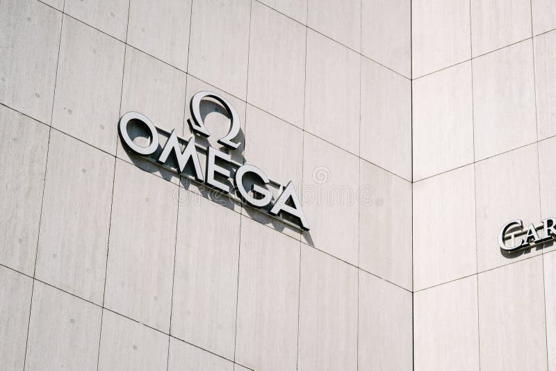 Logotipo De Omega En La Pared Imagen de archivo editorial - Imagen de ...