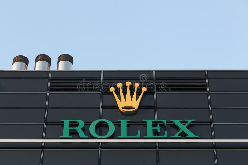 Insignia De Rolex En La Pared Del Almacén Fotografía editorial - Imagen ...