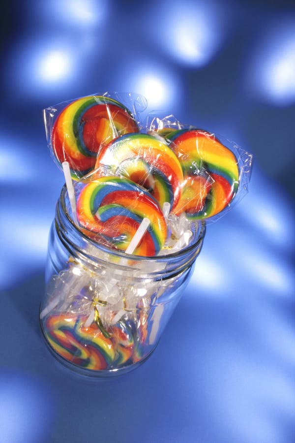 Lollipops in Glass Jar stock photo. Image of junk, lollipops - 130429770