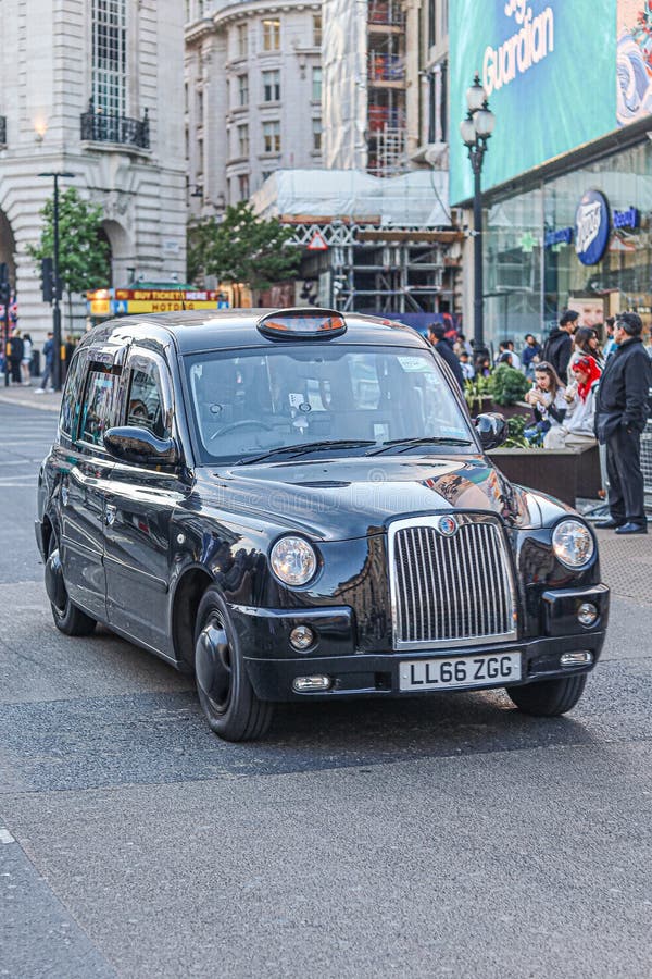 London City Taxi editorial photography. Image of vehicle - 252409492