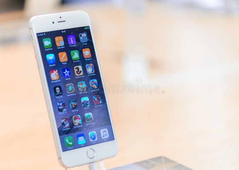 LONDON - JULY 2, 2015: Apps on the Operating System IOS on the a ...