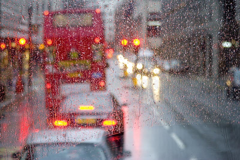 London Rain View To Red Bus through Rain-specked Window Stock Image ...