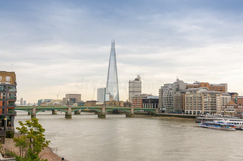 London Skyline and Thames River on a Cloudy Day Stock Photo - Image of ...