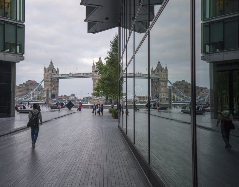 London Tower Bridge Reflecting on the Glass Fronts of Modern Buildings ...