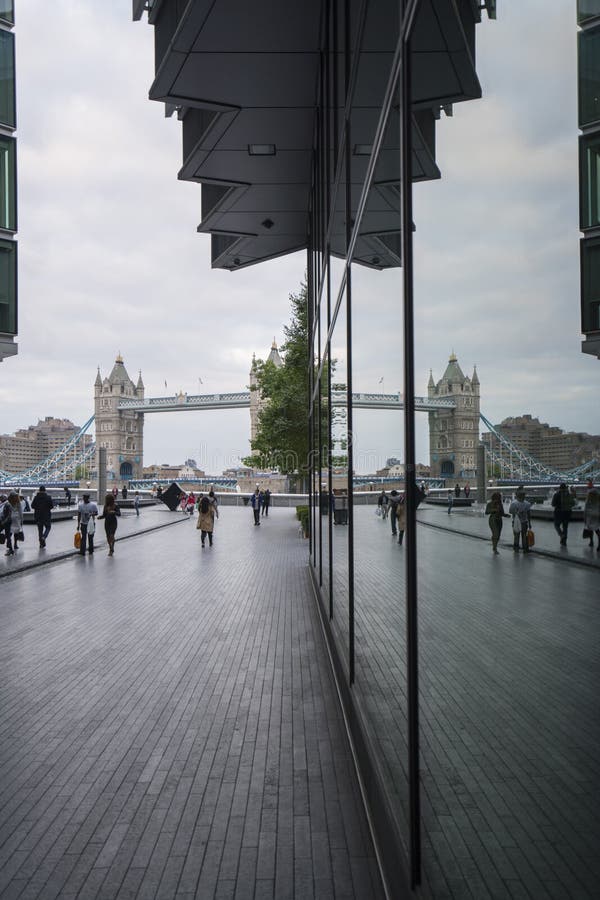 London Tower Bridge Reflecting on the Glass Fronts of Modern Buildings ...