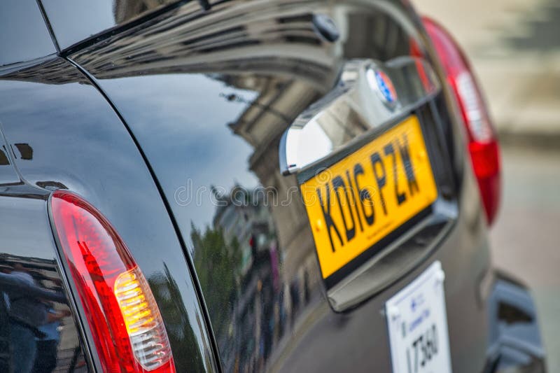 London, UK - June 2015: Black Cab Plate and City Reflections Editorial ...