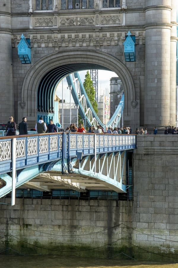 People Walking on Tower Bridge in London. the Tower Bridge Was Built ...